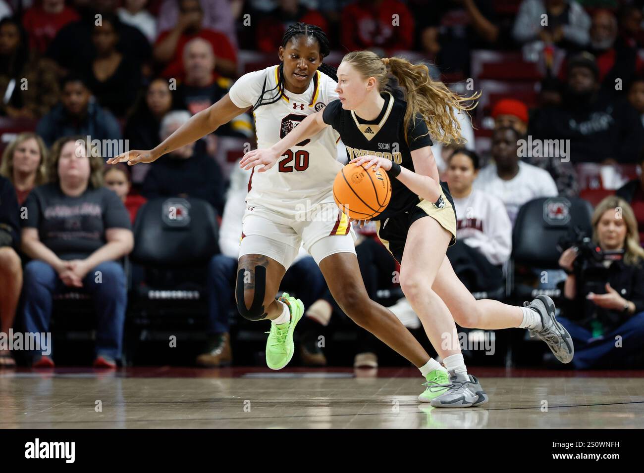 Wofford guard Maddie Heiss, right, drives against South Carolina ...