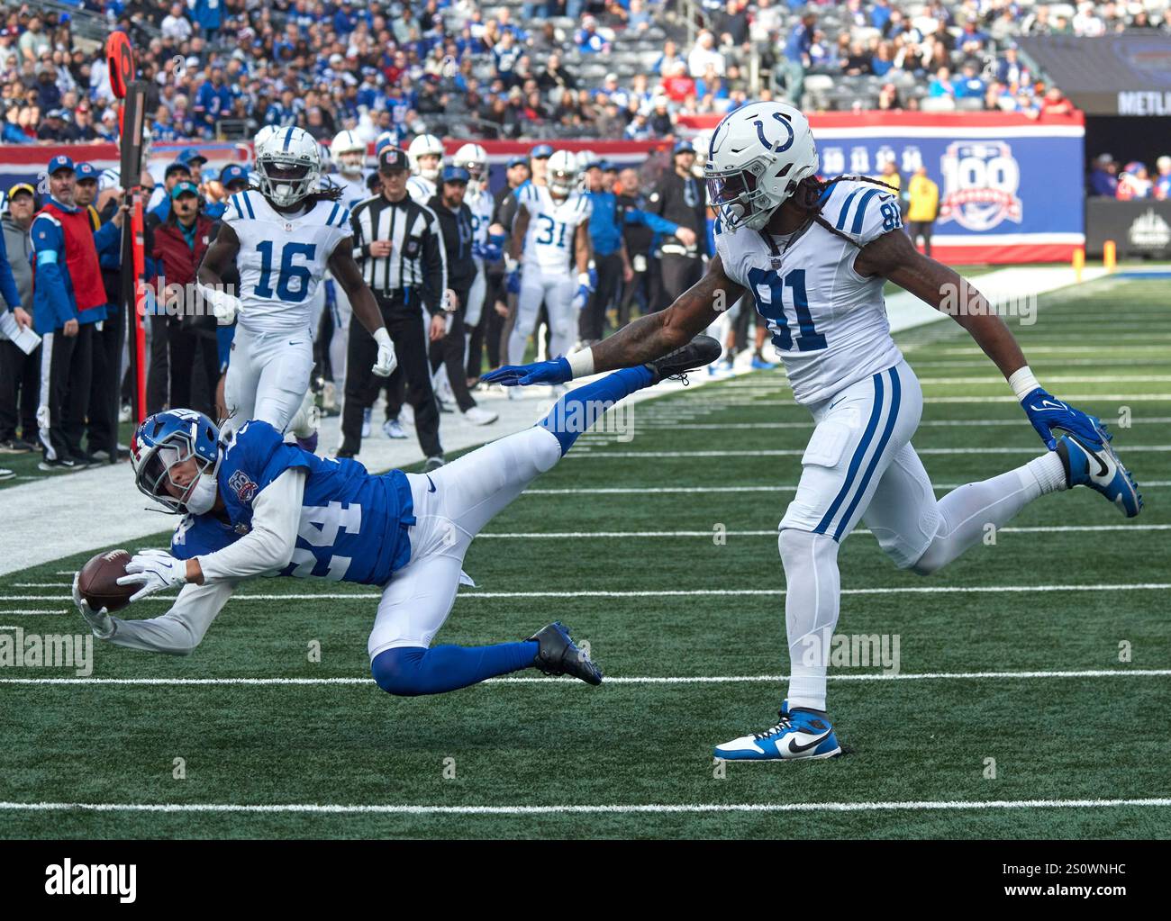 New York Giants safety Dane Belton (24) intercepts the ball intended ...