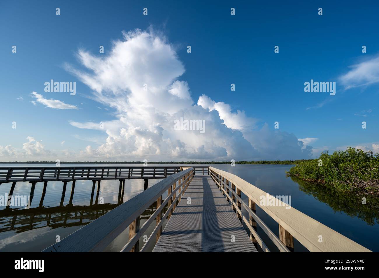 Dramatic summer morning cloudscape over West Lake and its boardwalk in ...