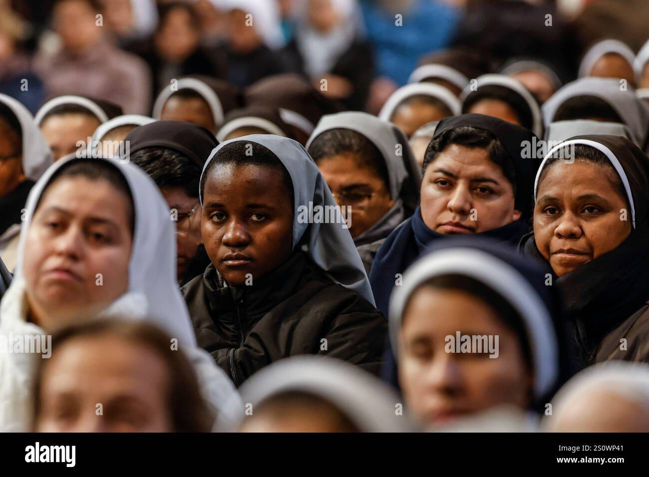 Rome, Italy. 29th Dec, 2024. Nuns attend a Mass following a ceremony ...