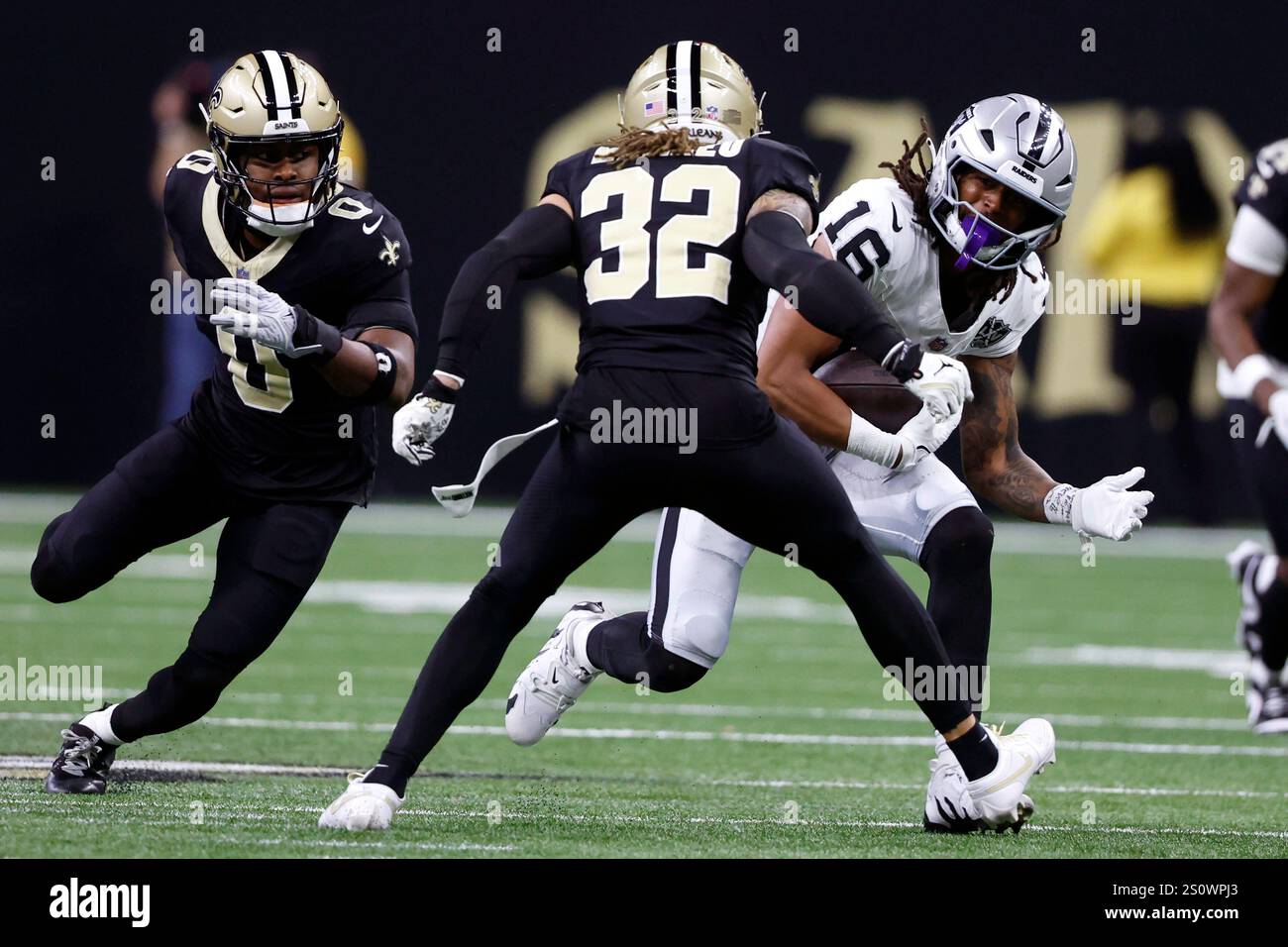 Las Vegas Raiders wide receiver Jakobi Meyers (16) runs from New Orleans Saints safety Tyrann ...