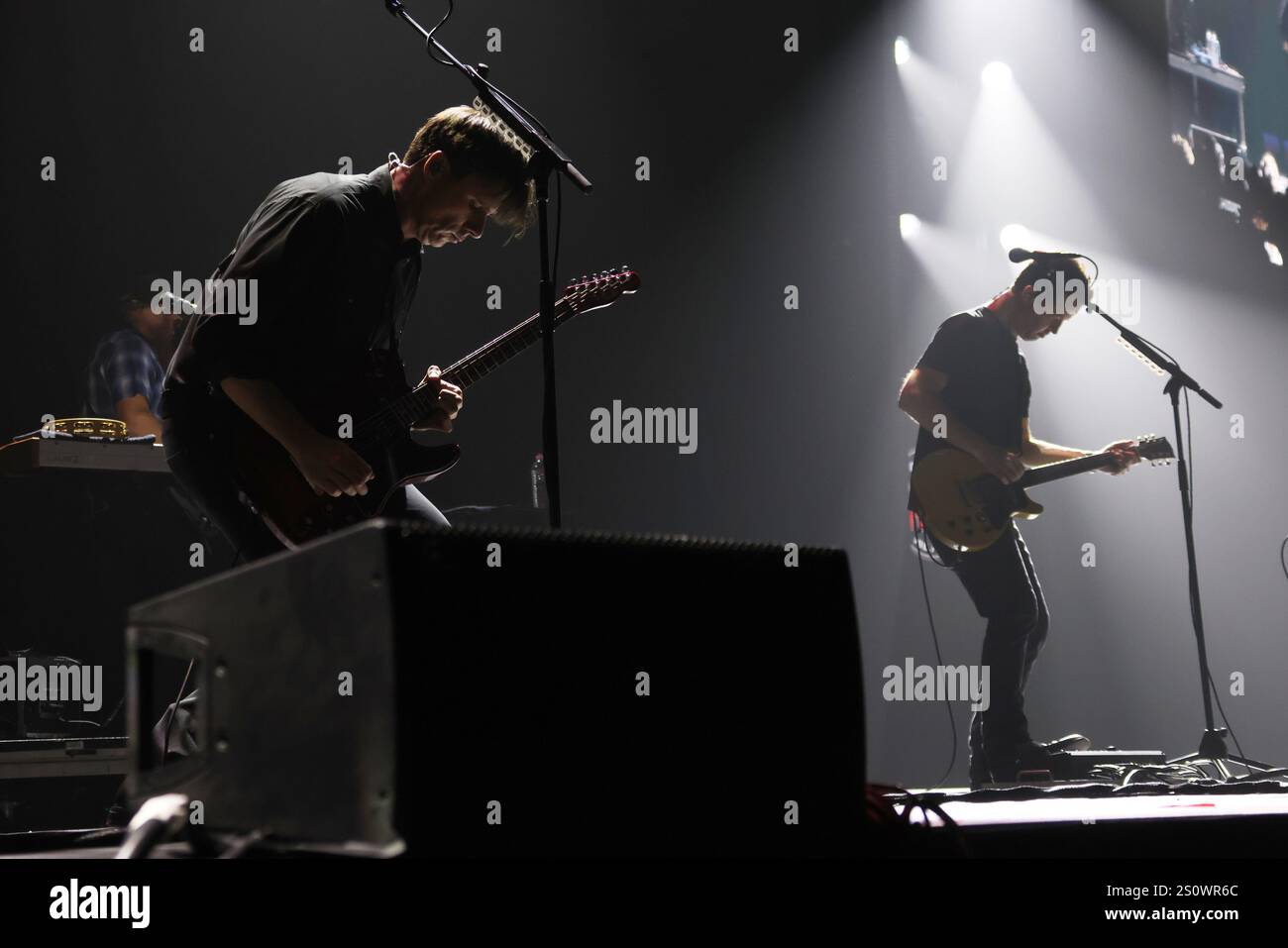 Jim Adkins and Tom Linton of Jimmy Eat World performs onstage during ...