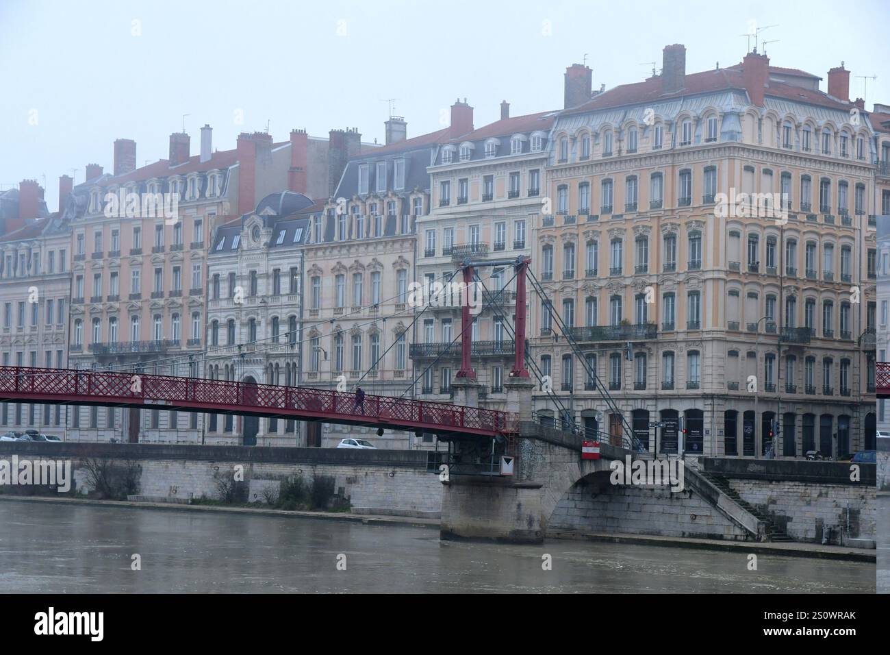 Lyon, Rhone, France. 29th Dec, 2024. People spotted on a bridge over ...