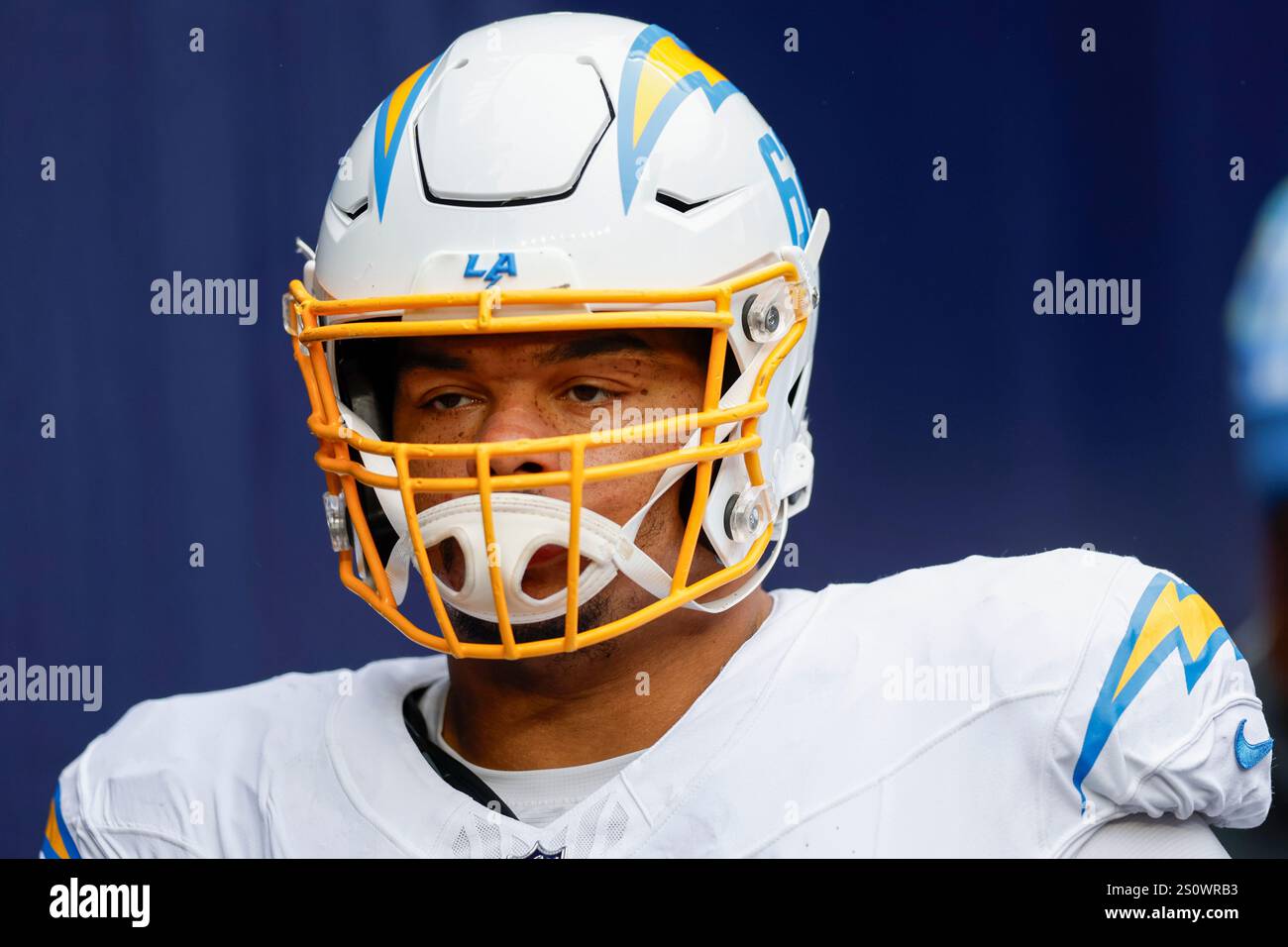 Los Angeles Chargers center Sam Mustipher (62) takes the field prior to ...