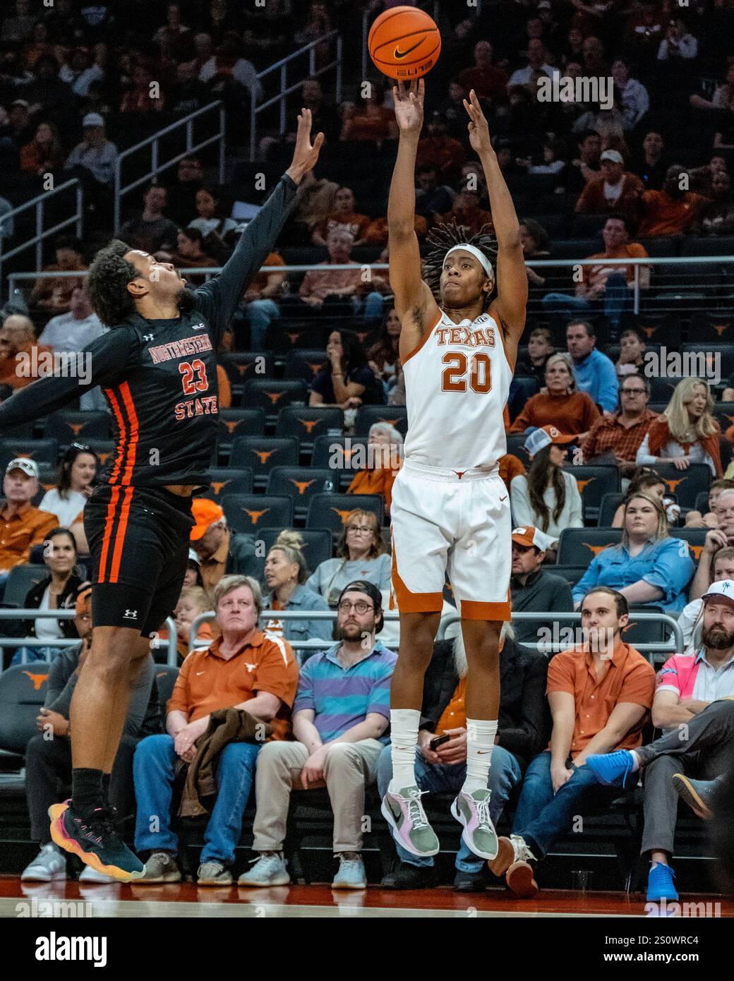 Dec 29, 2024. Tre Johnson (20) of the Texas Longhorns in action vs the ...