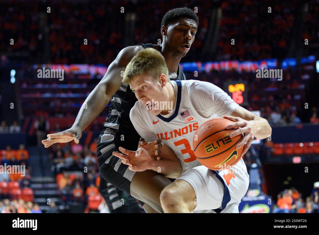 Illinois' Ben Humrichous, front, drives past Chicago State's Dailliss ...