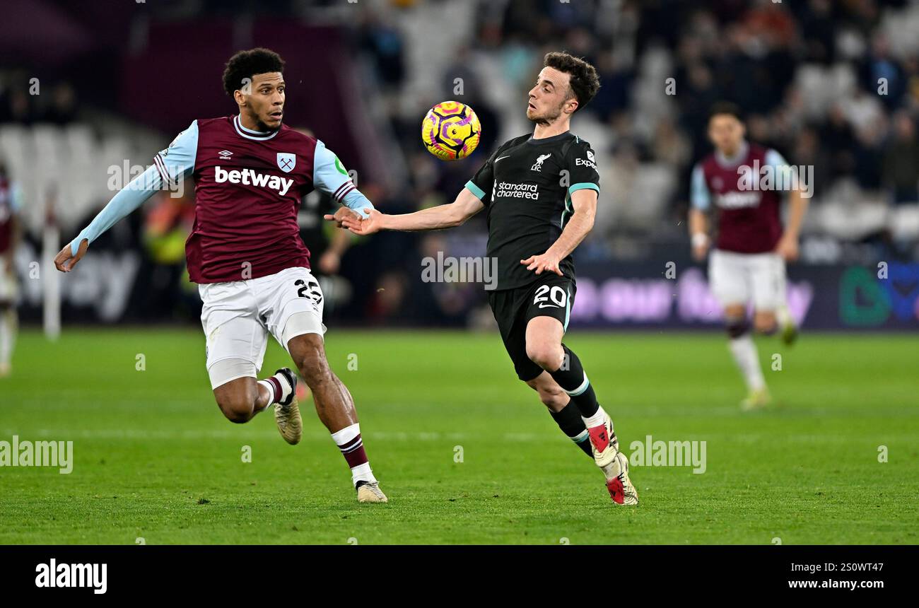 London, UK. 29th Dec, 2024. Diogo Jota (Liverpool) and Jean-Clair ...
