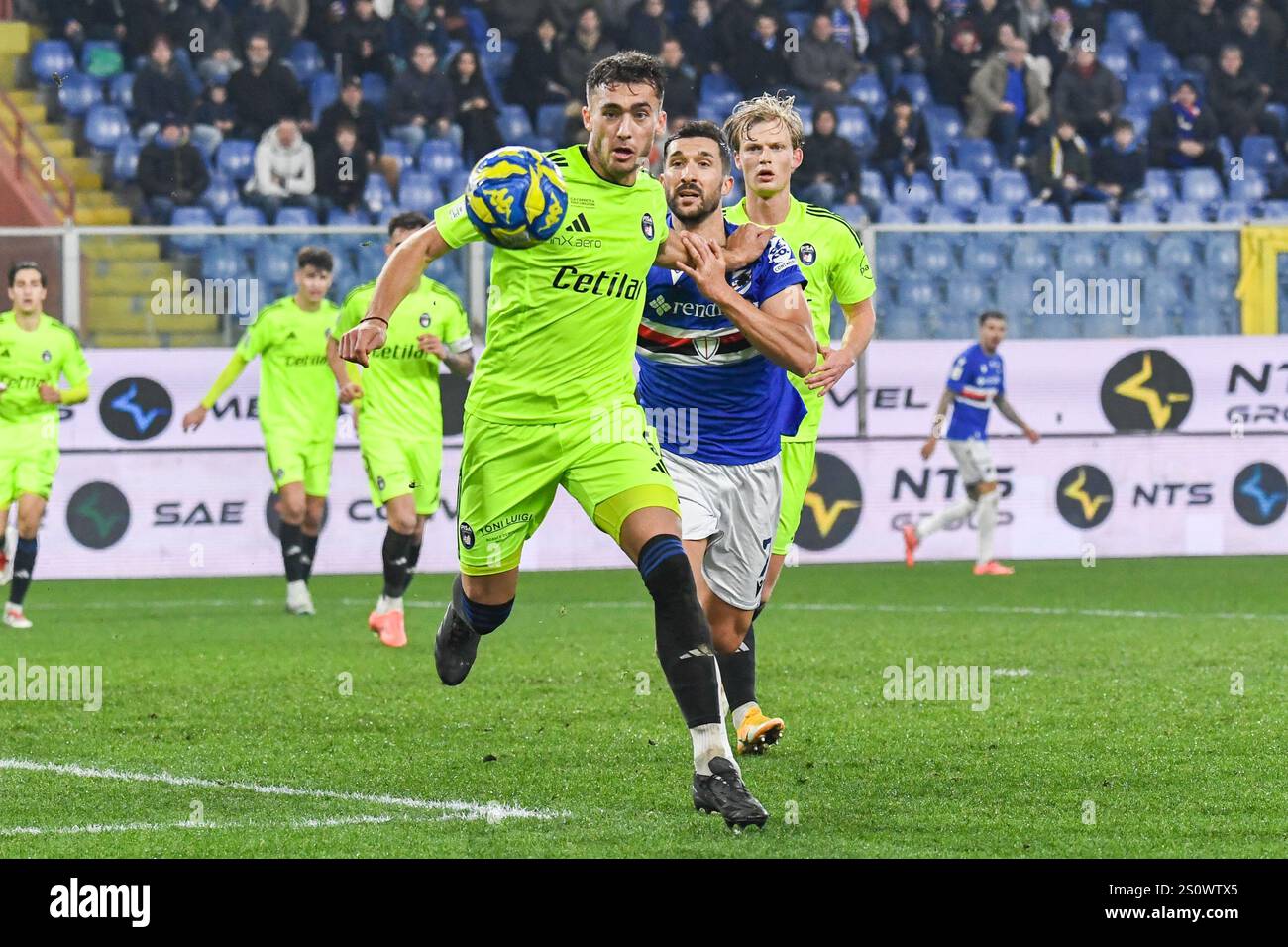 Genoa, Italy. 29th Dec, 2024. Simone Canestrelli (Pisa) hampered by ...