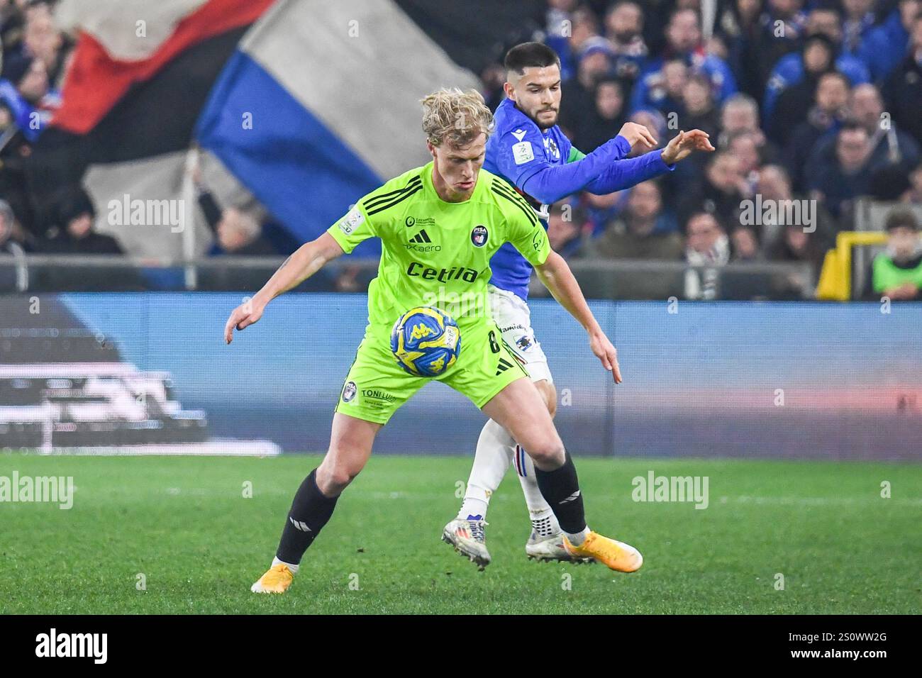 Genoa, Italy. 29th Dec, 2024. Malthe Hojholt (Pisa) fights for the ball ...