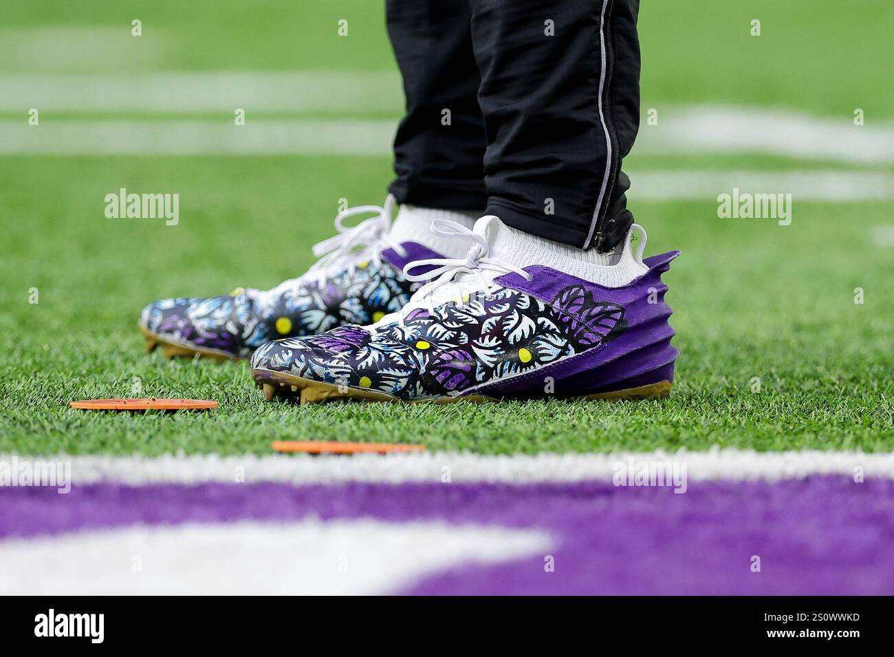A detail view of Minnesota Vikings safety Camryn Bynum's cleats before ...