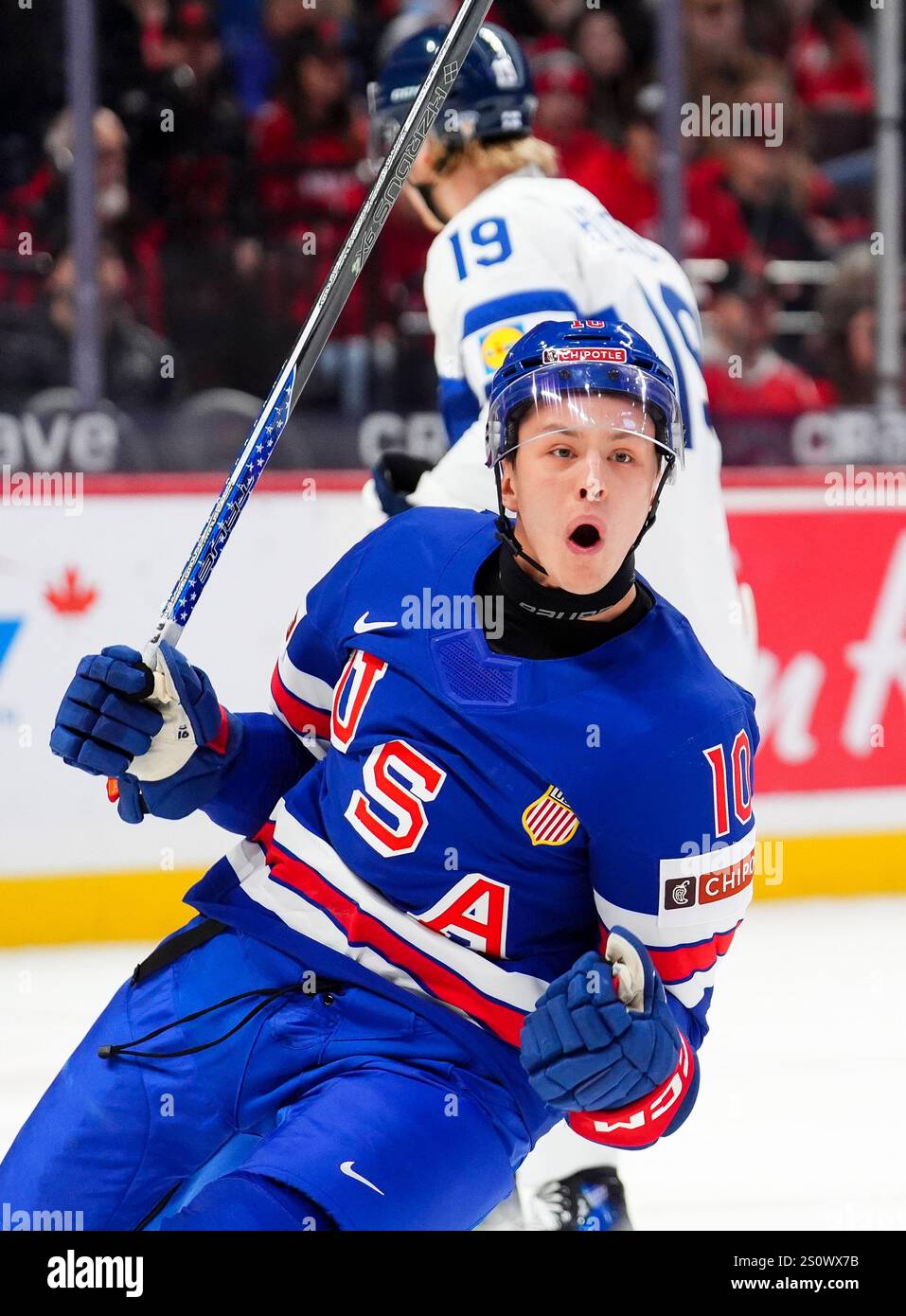 USA forward Carey Terrance (10) celebrates a first period goal as ...