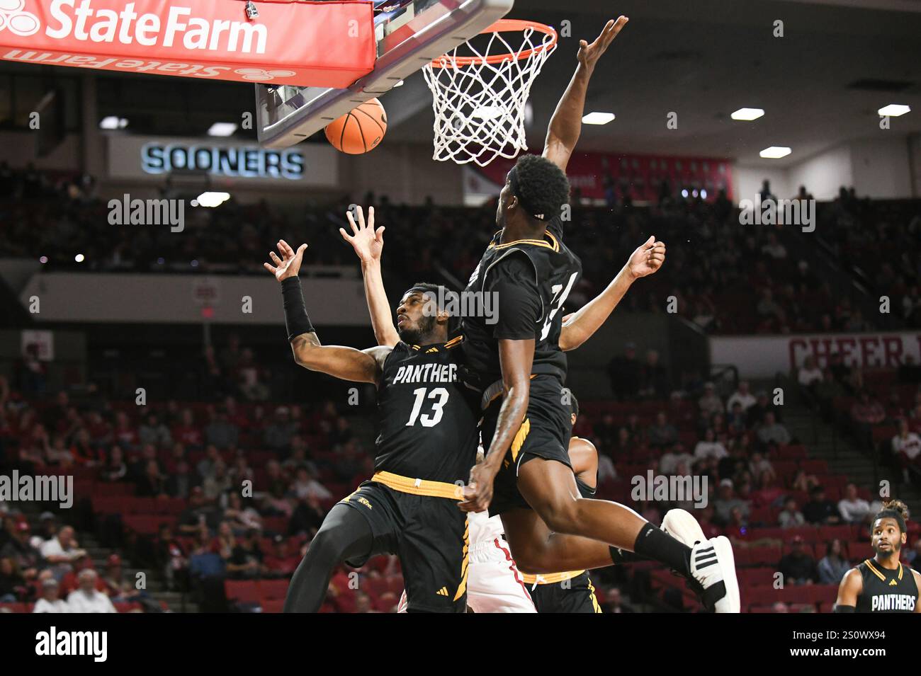 Prairie View A&M guard Elijah Terry, left, and forward Marcel Bryant ...