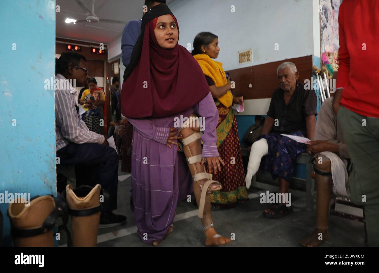Kolkata, West Bengal, INDIA. 29th Dec, 2024. An amputee tries her newly ...