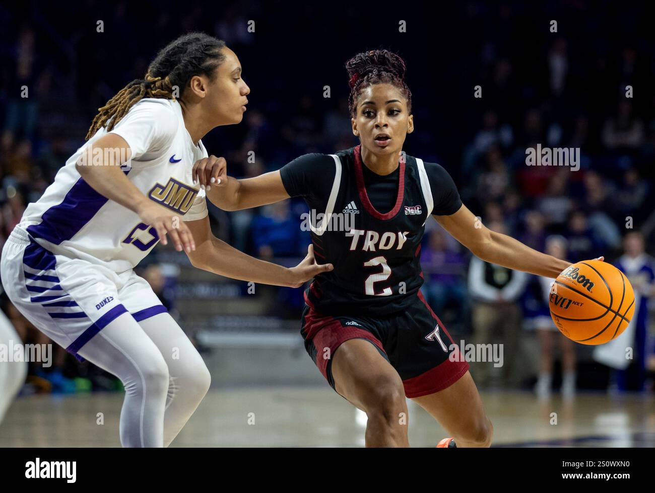 Troy guard Ashley Baez (2) drives to the basket against James Madison ...