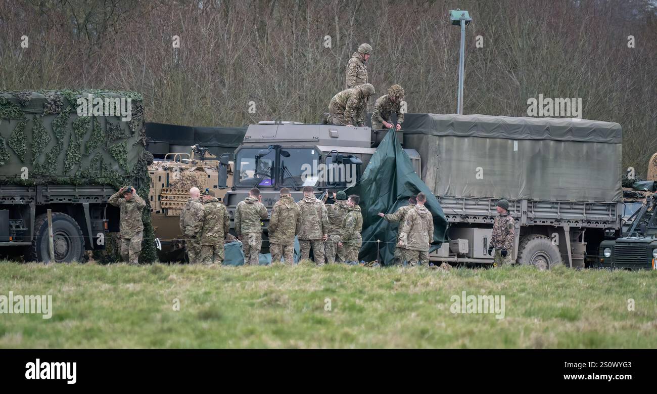 a division of British army cavalry and armoured brigades assembled in a ...