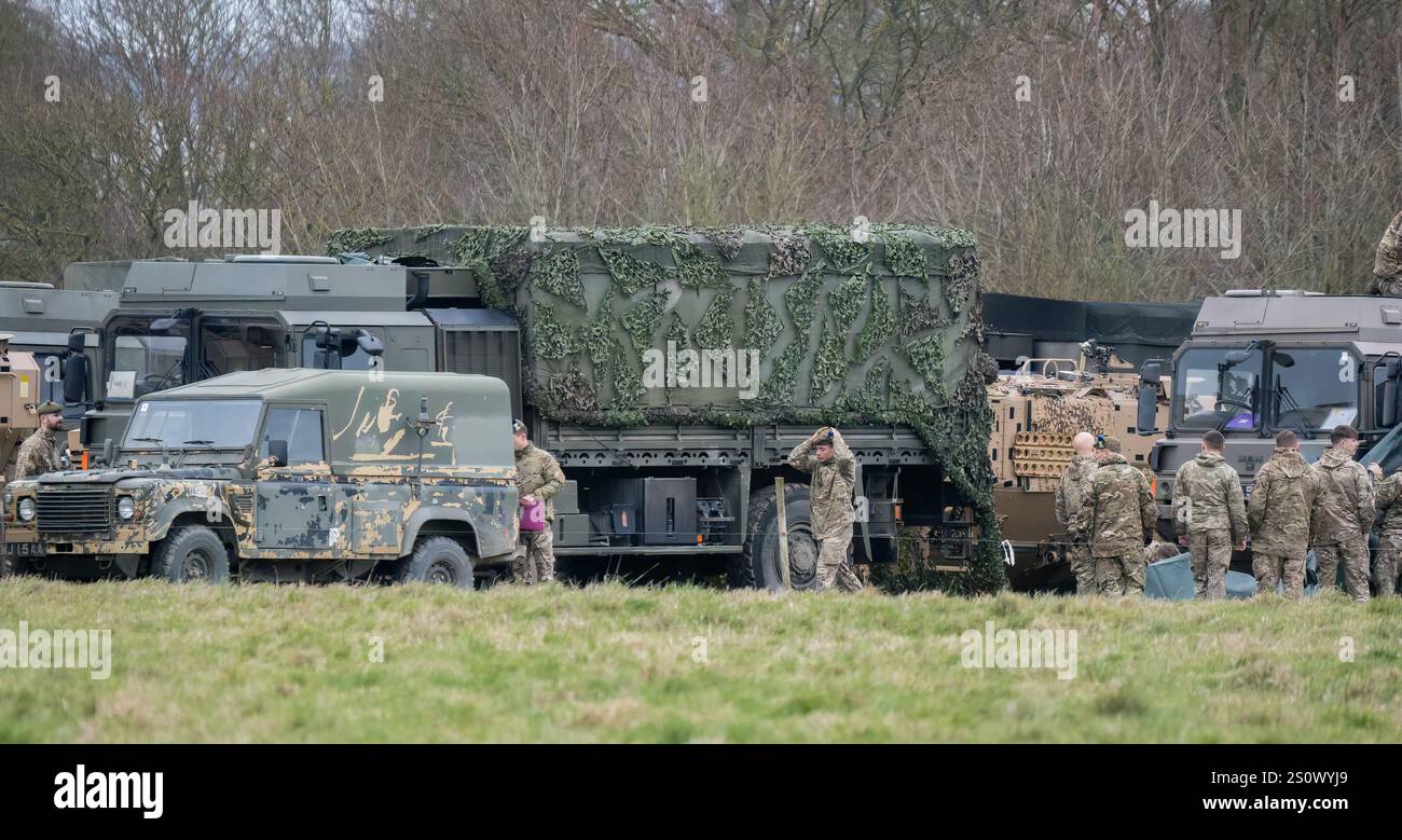 a division of British army cavalry and armoured brigades assembled in a ...