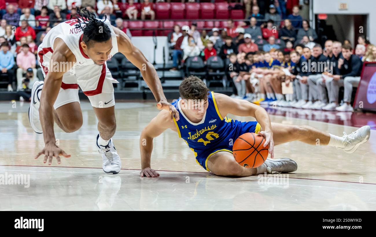 South Dakota State guard Kalen Garry (10) falls but maintains ...