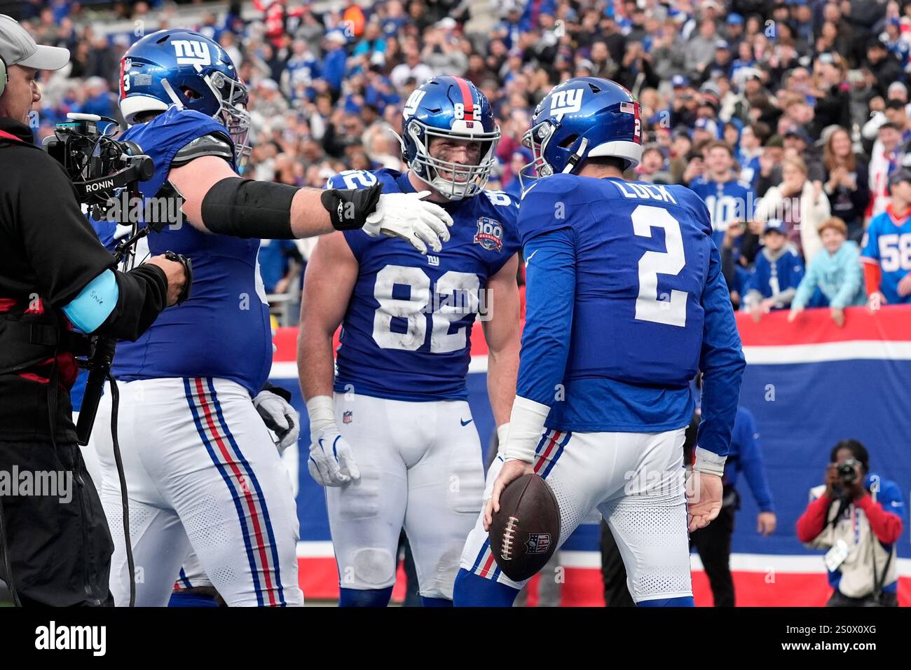 New York Giants quarterback Drew Lock (2) celebrates with tight end ...