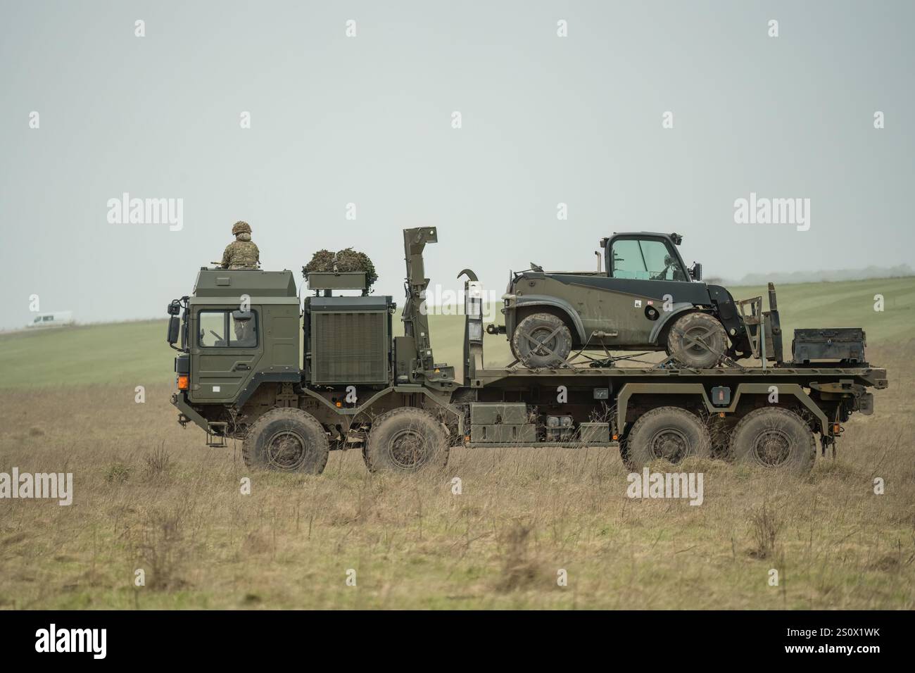 British army MAN SV 8x8 EPLS logistics truck carrying a JCB Fork Lift ...