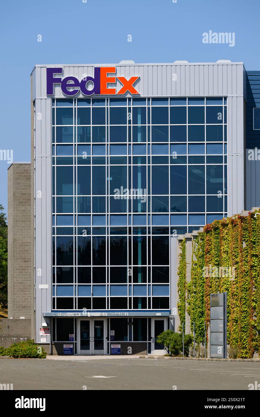 Everett, WA, USA - July 28, 2024; Multistory FedEx building with name on structure in company ...