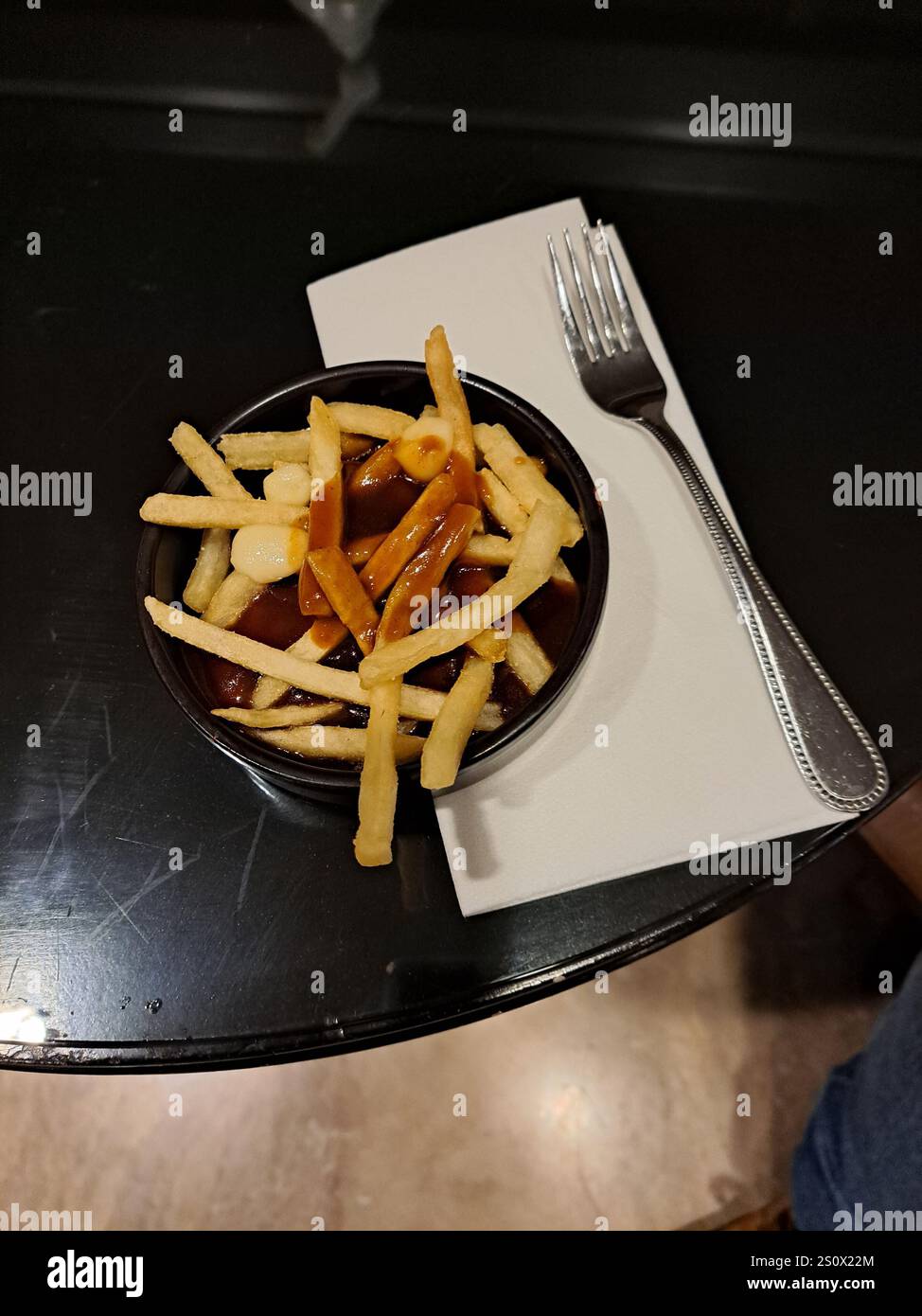Bowl of poutine at the Sheraton Hotel on Rene Levesque West in downtown ...