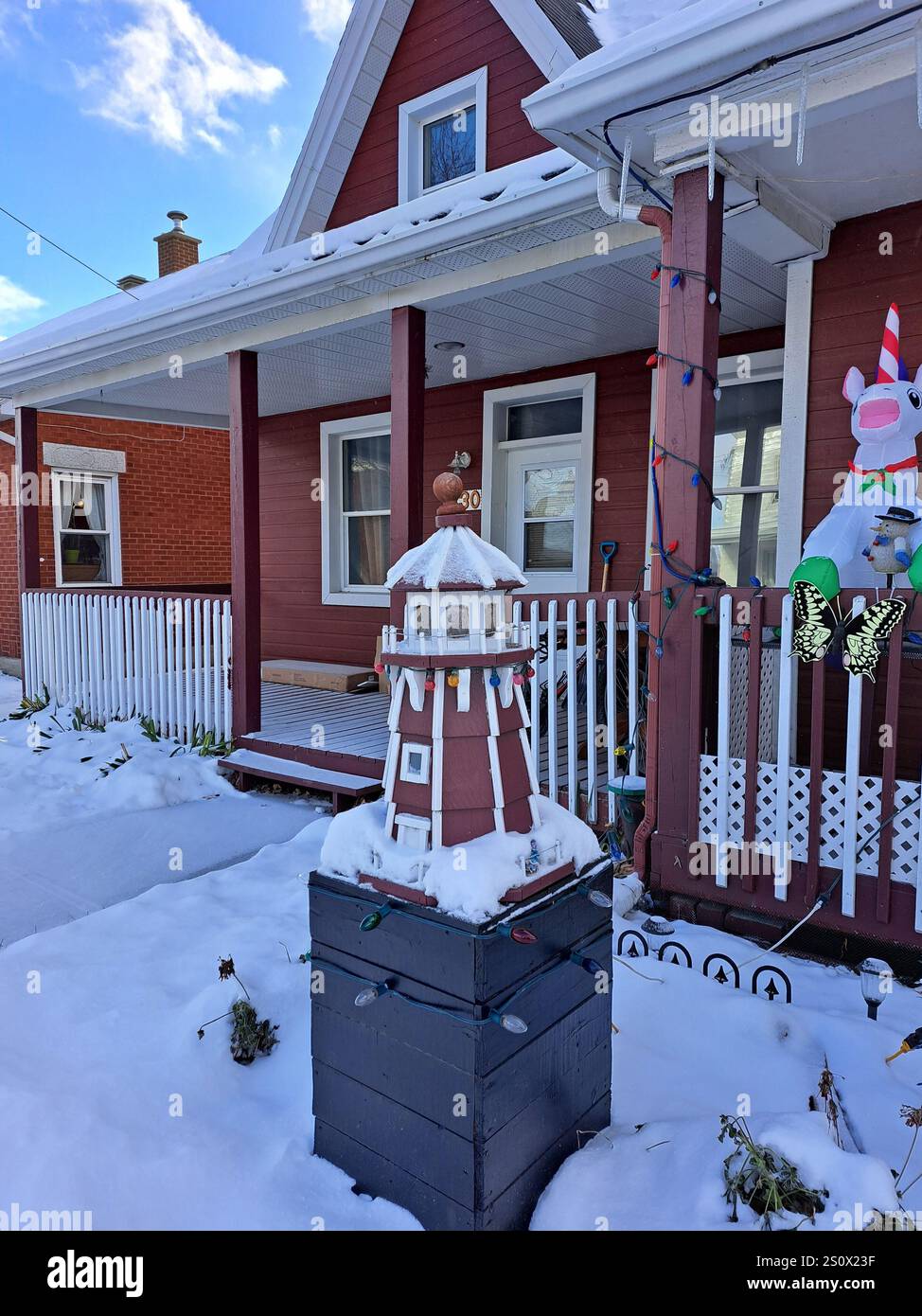 Christmas decorations on rue Saint-Simon in Sainte-Madeleine, Quebec ...