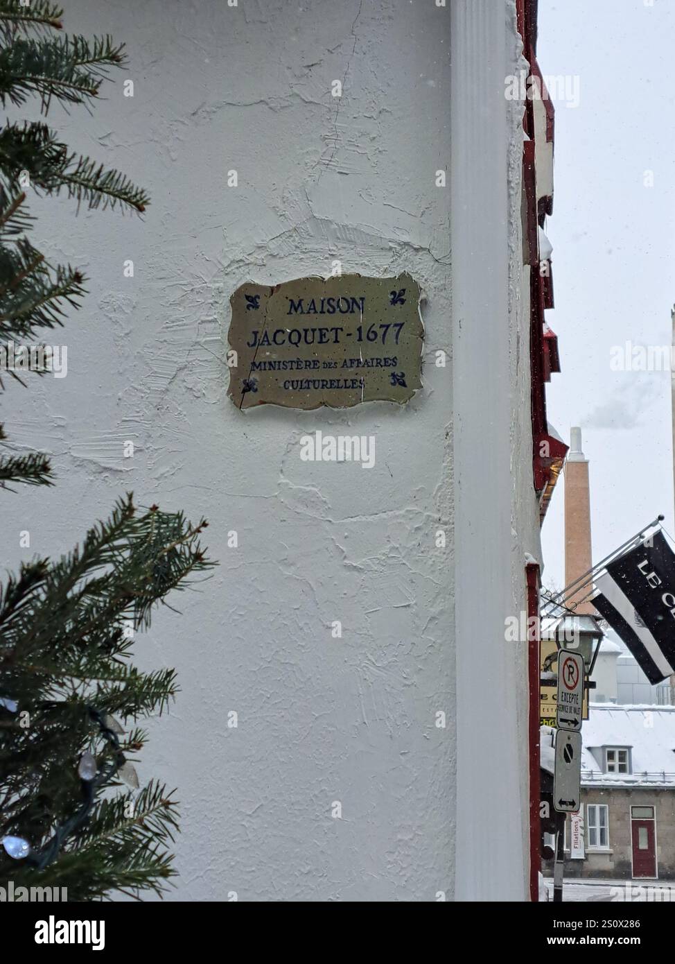 Maison Jacquet sign one of the oldest residences on rue Saint-Louis in ...