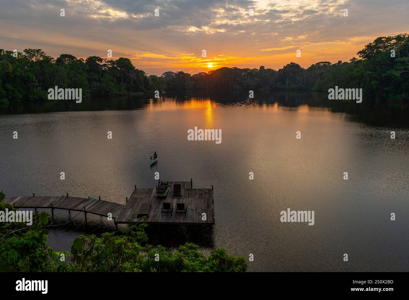 Amazon rainforest sunrise with canoe, Yasuni national park, Ecuador ...