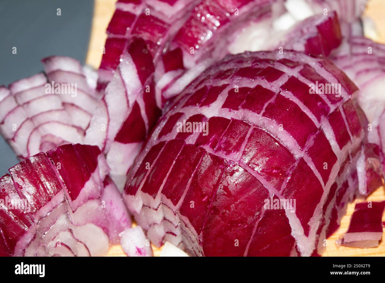 Close Up of Sliced Chopped Red Onion on Wooden Chopping Board Stock ...