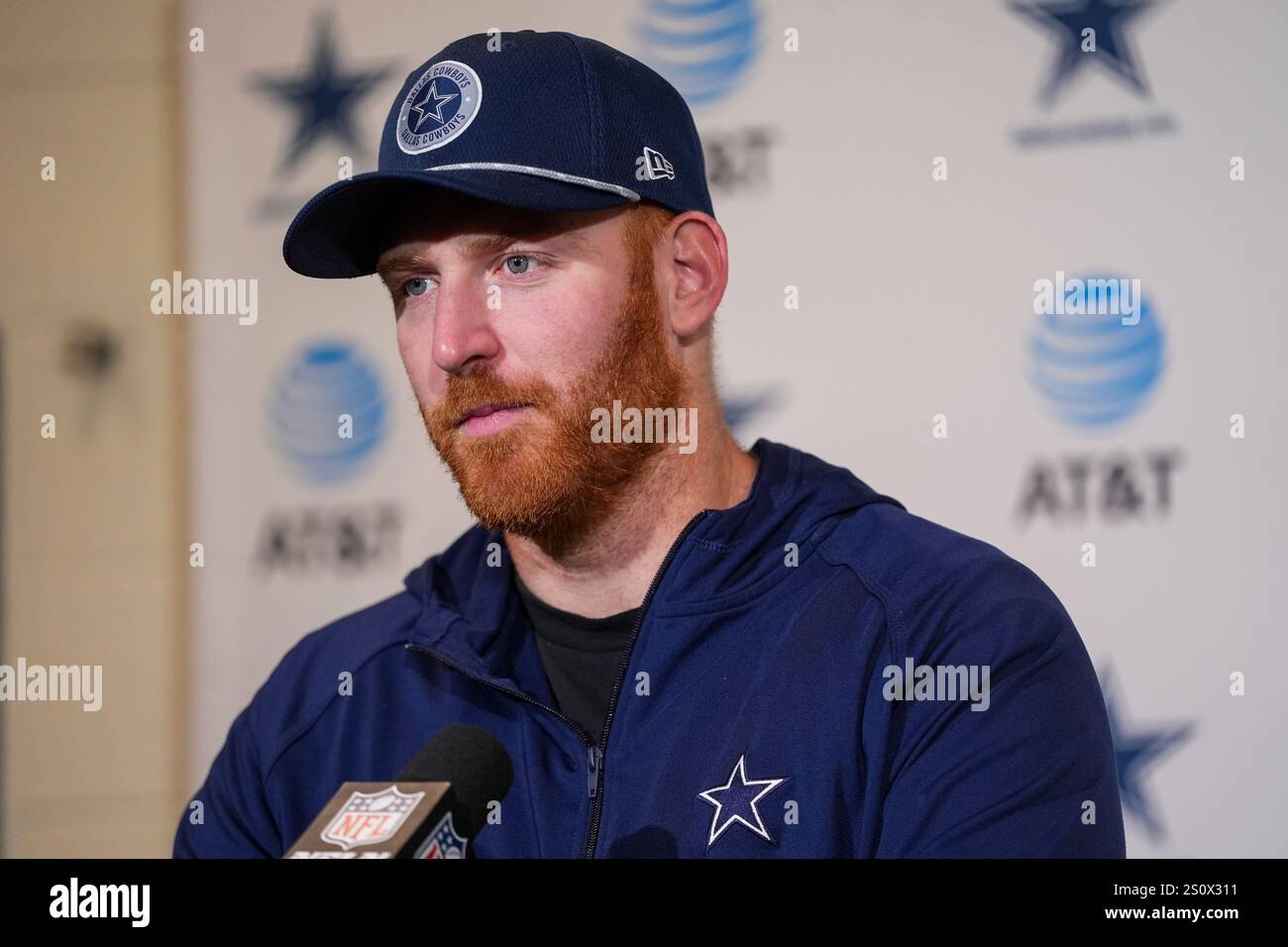 Dallas Cowboys quarterback Cooper Rush speaks to reporters following an ...