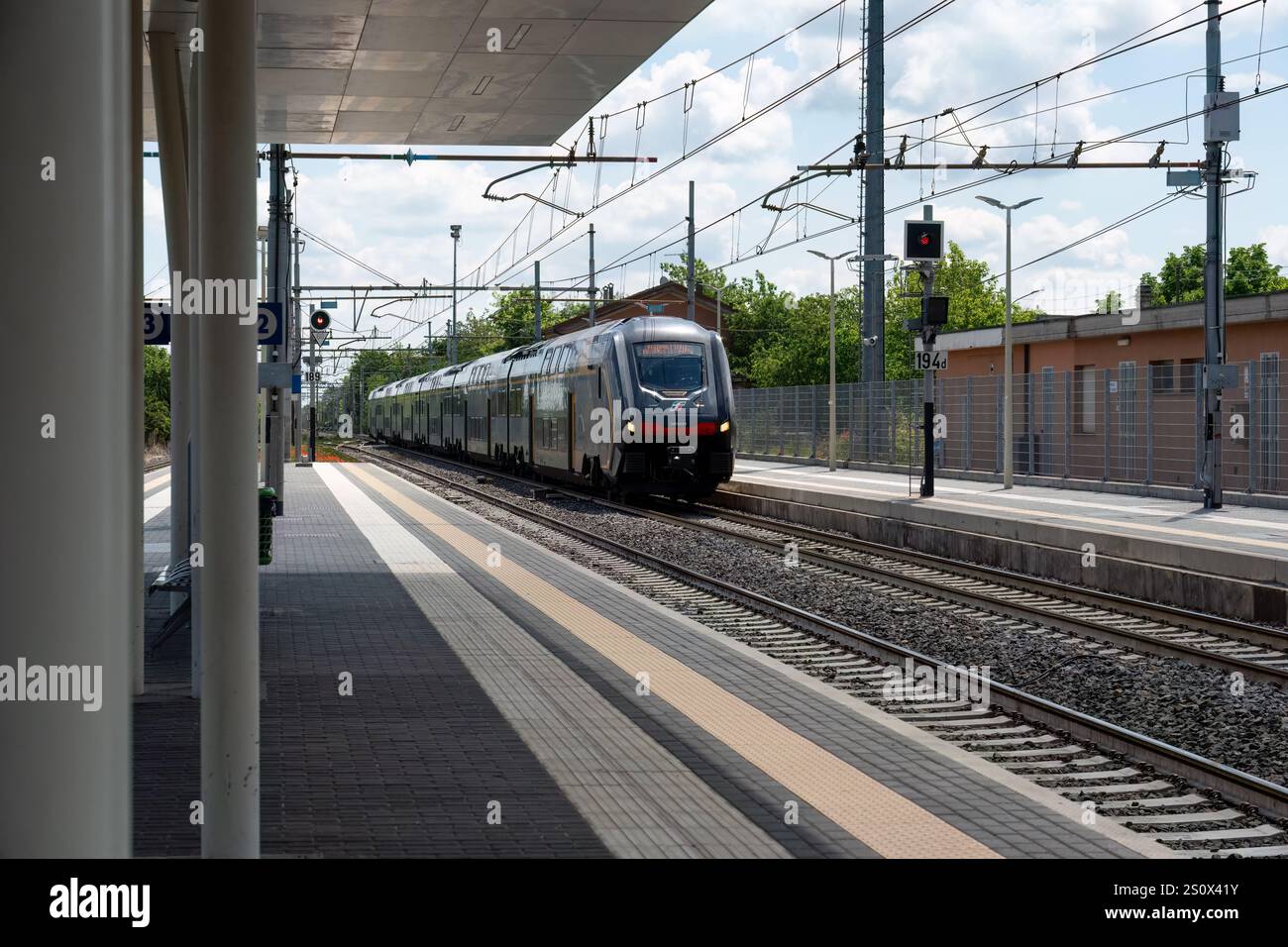 Italian electric high speed train passes through the station Stock ...