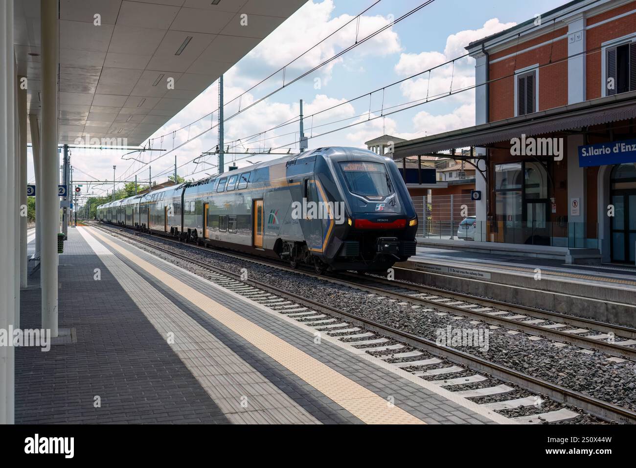 Italian electric high speed train passes through the station Stock ...