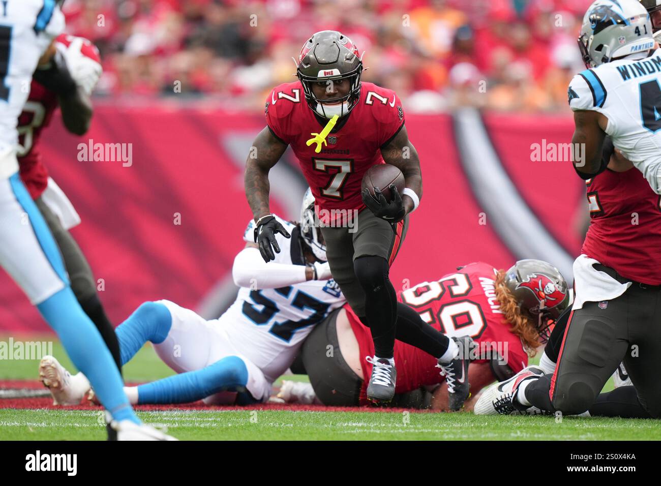 Tampa Bay Buccaneers running back Bucky Irving (7) rushes with the ball ...