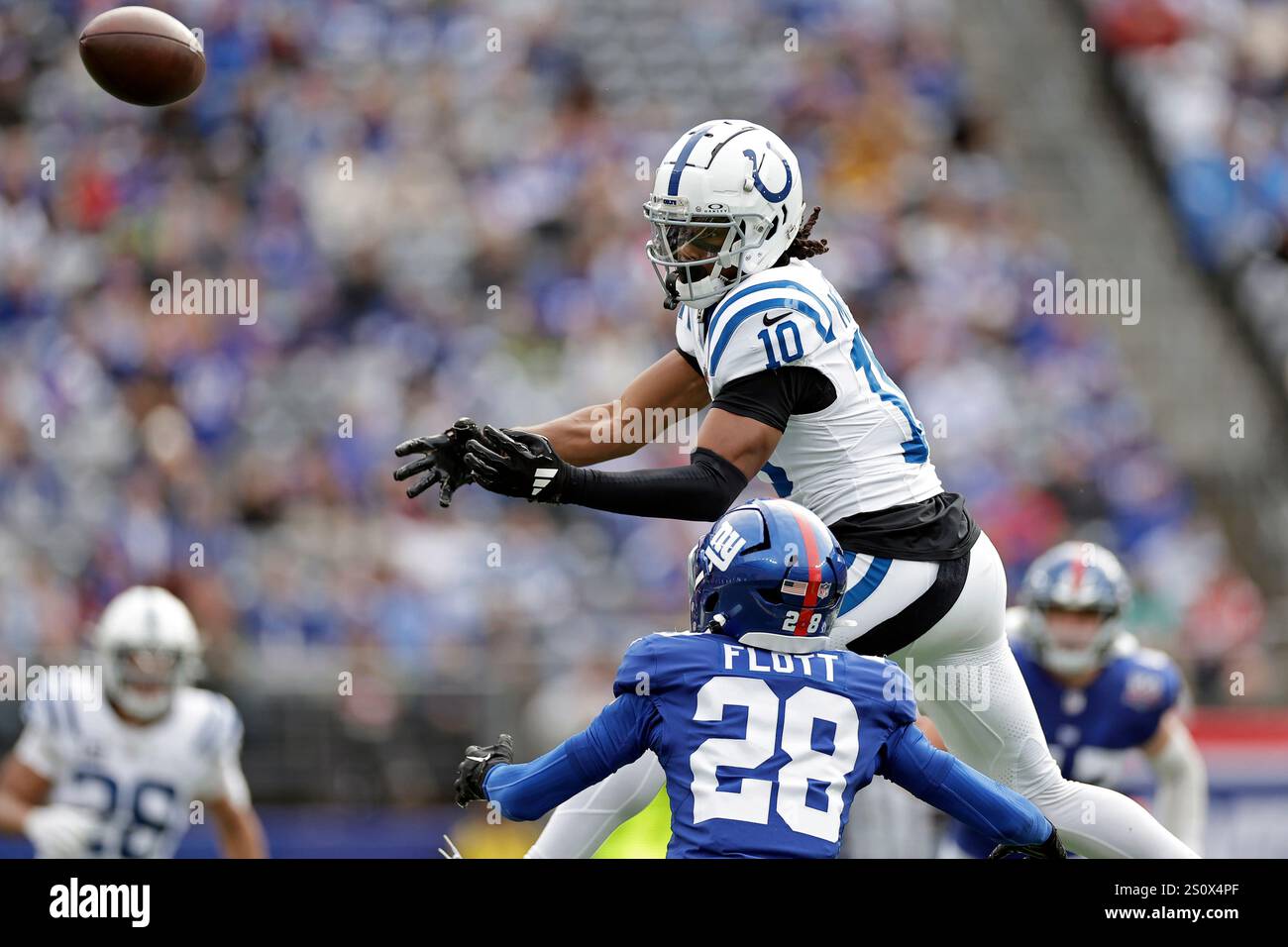 Indianapolis Colts wide receiver Adonai Mitchell (10) misses a catch in ...