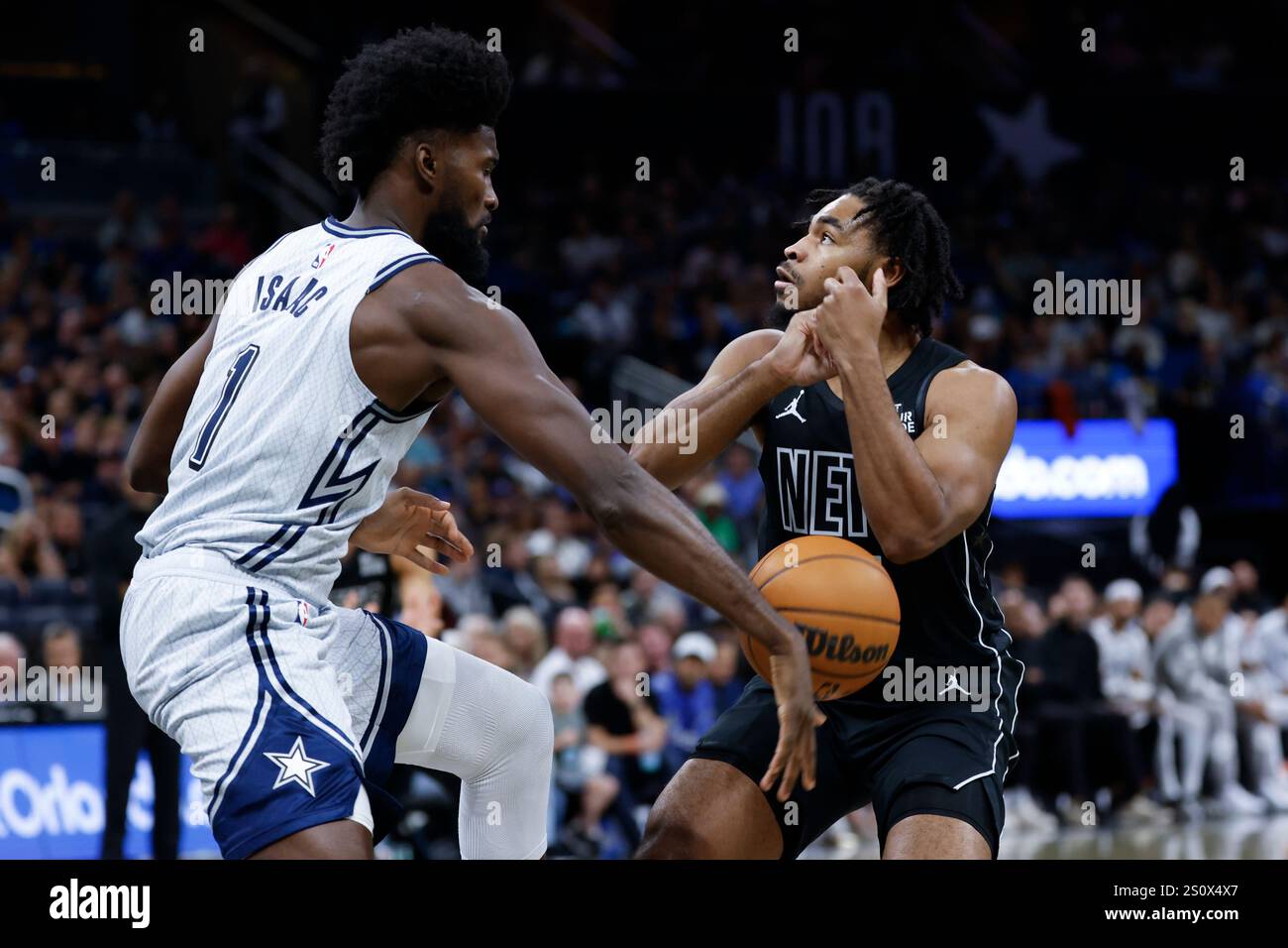 Orlando Magic forward Jonathan Isaac (1) slaps the ball out of the ...