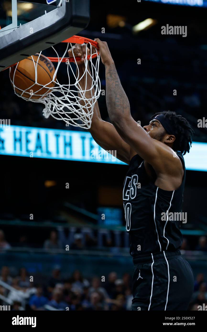 Brooklyn Nets center Day'Ron Sharpe dunks against the Orlando Magic ...