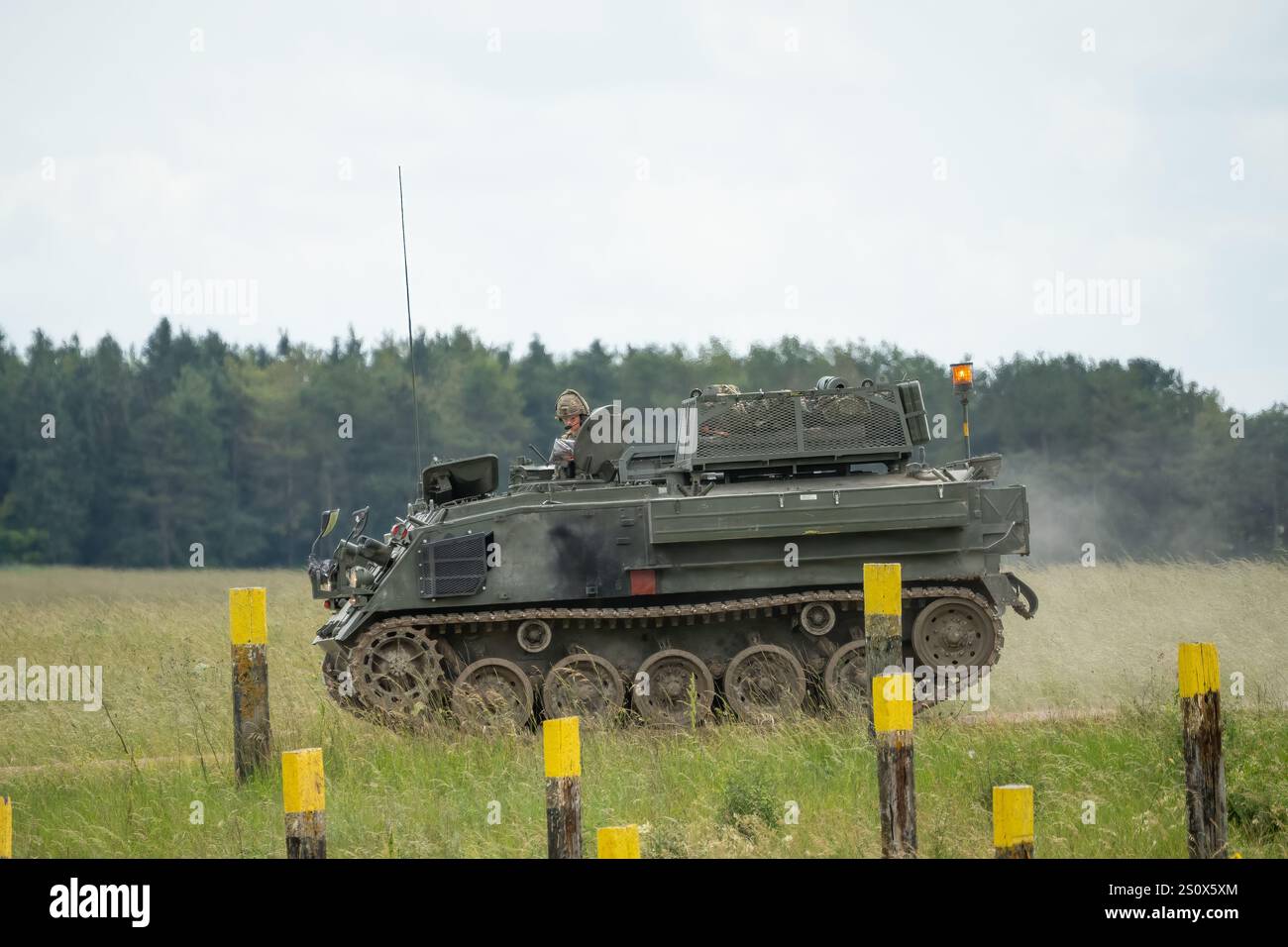 British army Bulldog FV432 in motion, in action on a military exercise ...
