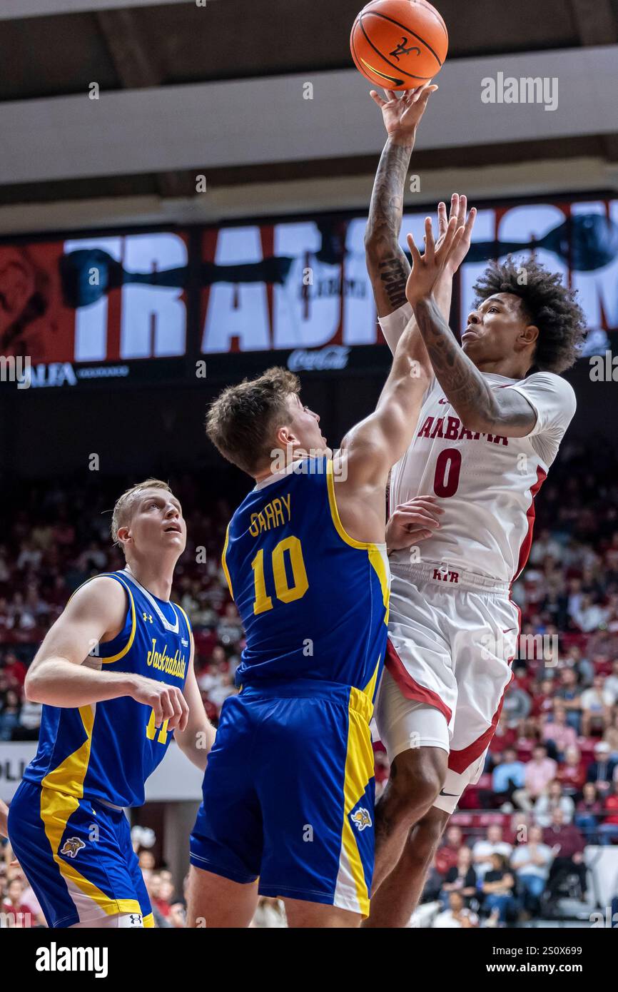 Alabama guard Labaron Philon (0) shoots over South Dakota State guard ...