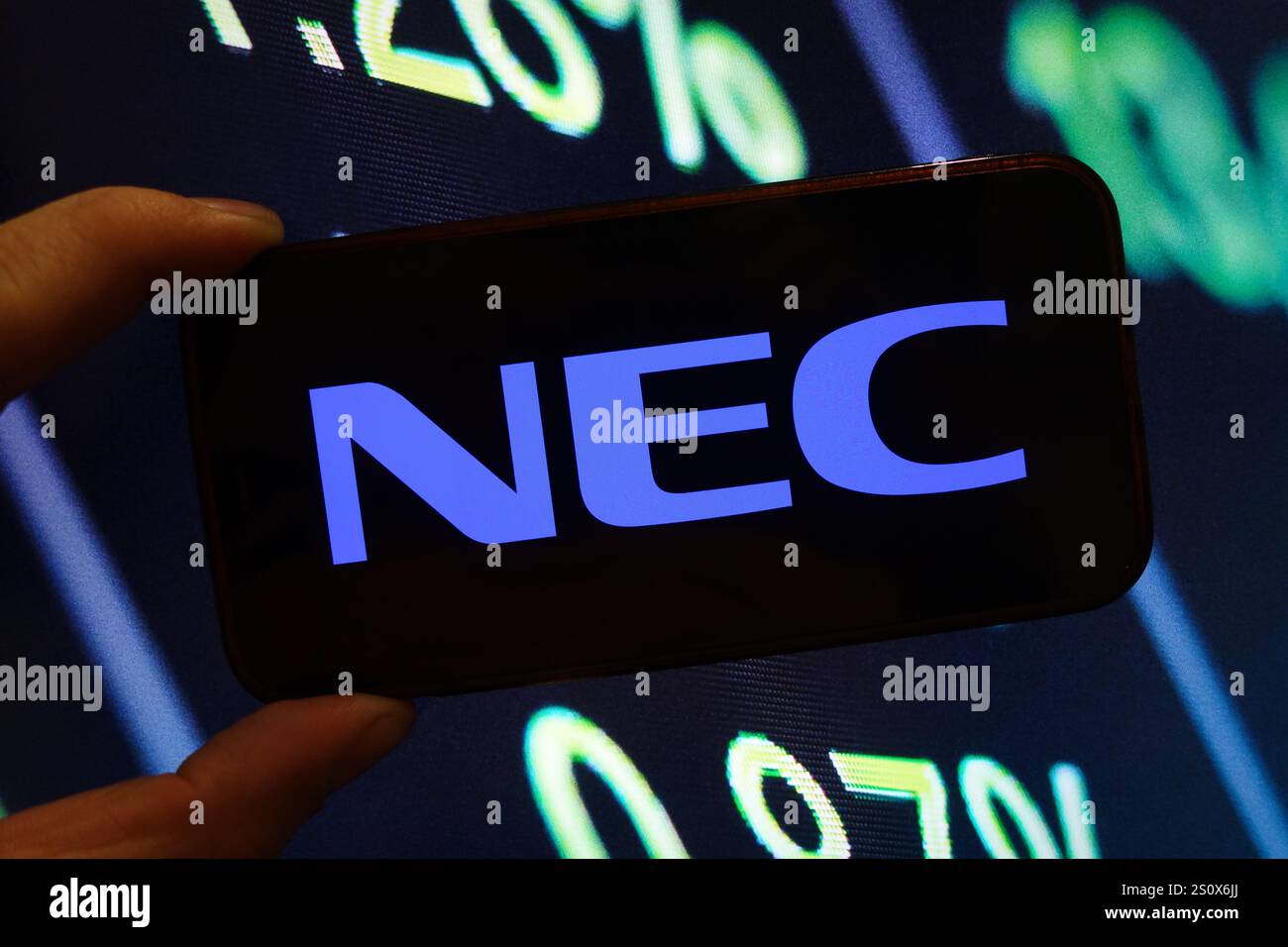 In this photo illustration, the NEC Corporation company logo is seen ...