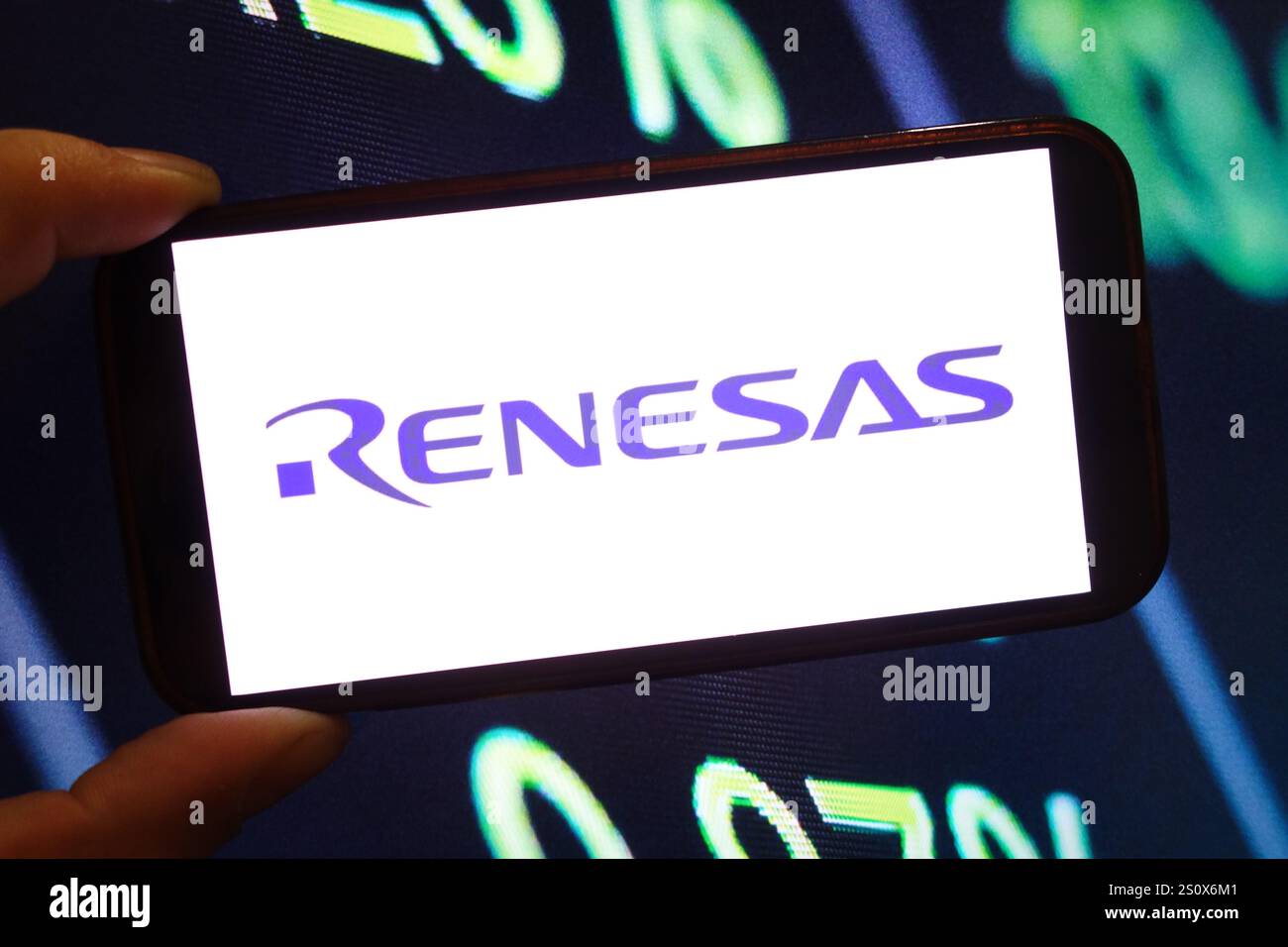 In this photo illustration, the Renesas Electronics company logo is ...