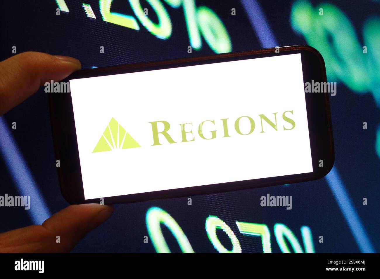 In this photo illustration, the Regions Financial company logo is seen ...