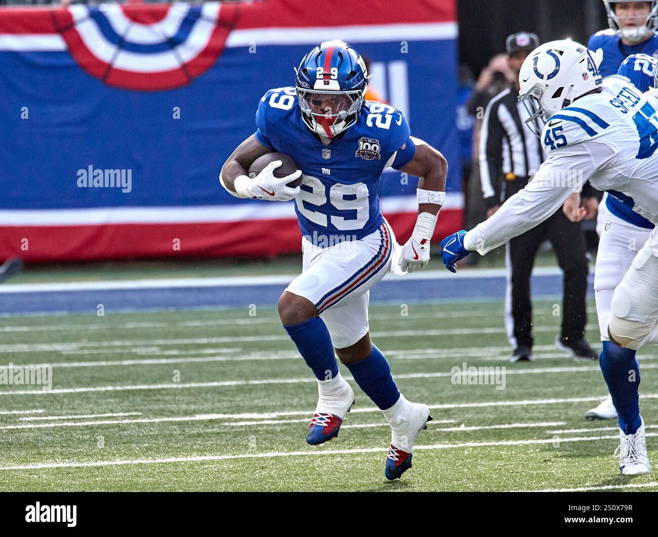 New York Giants running back Tyrone Tracy Jr. (29) looks for running ...