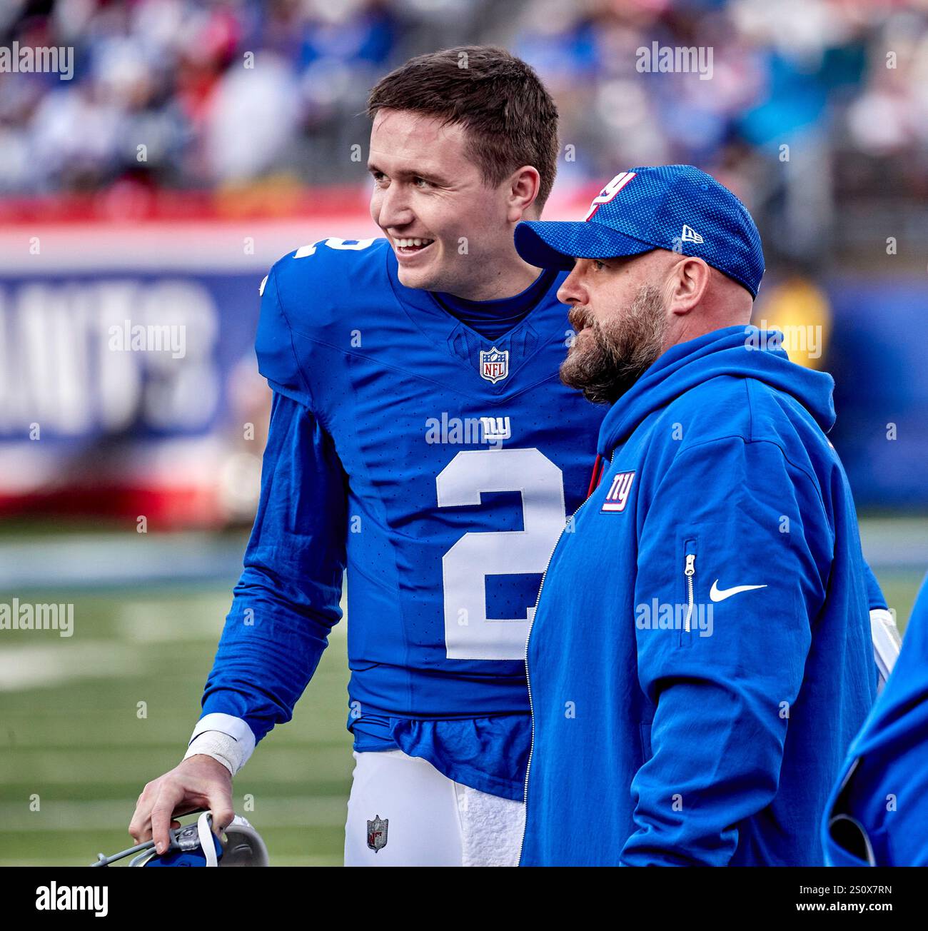 New York Giants quarterback Drew Lock (2) and head coach Brian Daball ...