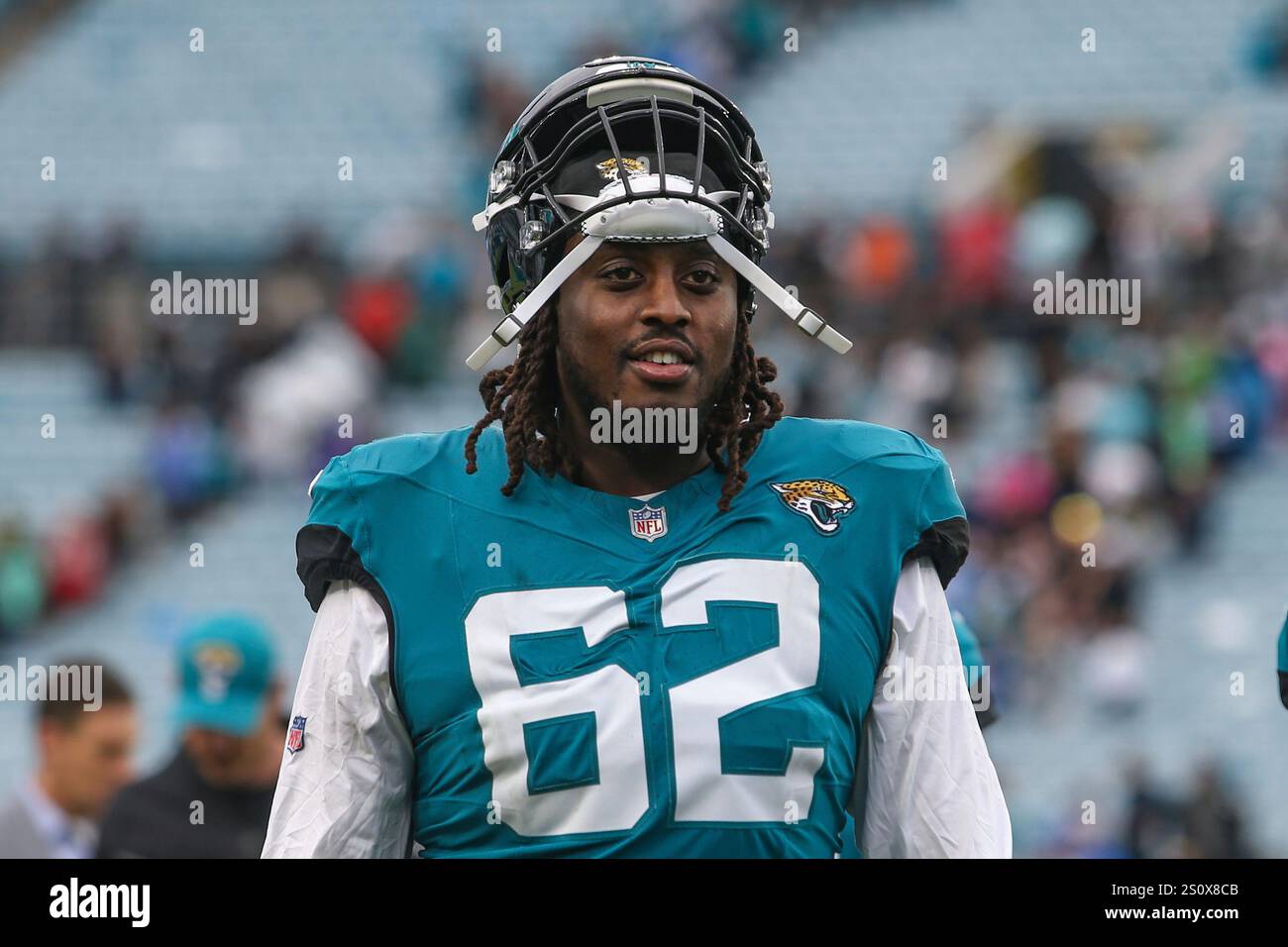 Jacksonville Jaguars offensive tackle Javon Foster (62) walks off the ...