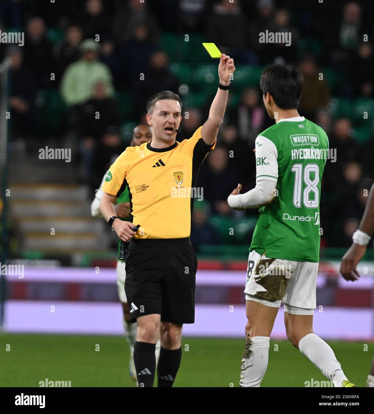 Hibs kwon hyeok kyu booked by referee hi-res stock photography and ...
