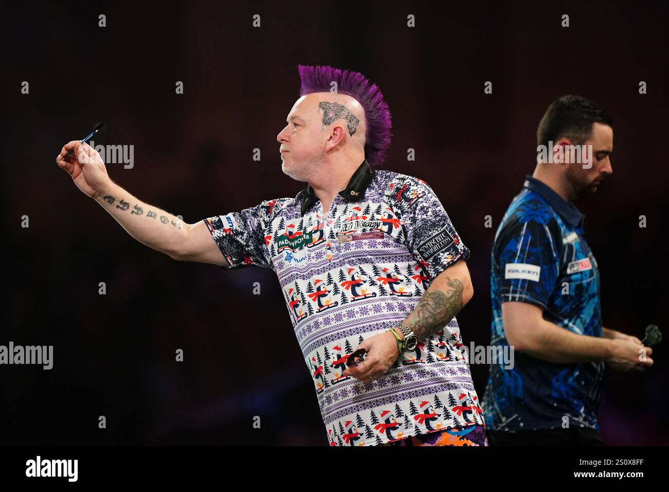 Peter Wright in action during his fourth round match against Luke ...