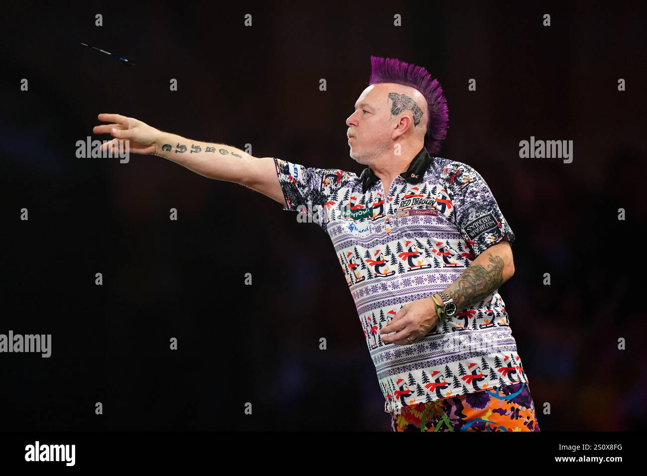 Peter Wright in action during his fourth round match against Luke ...