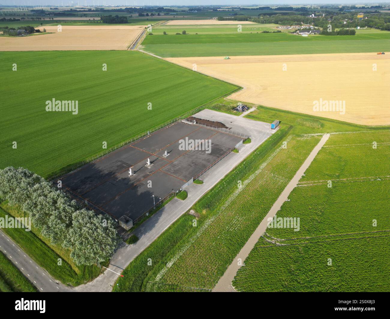 Aerial view of a gas production field, Zeerijp, Groningen, The ...