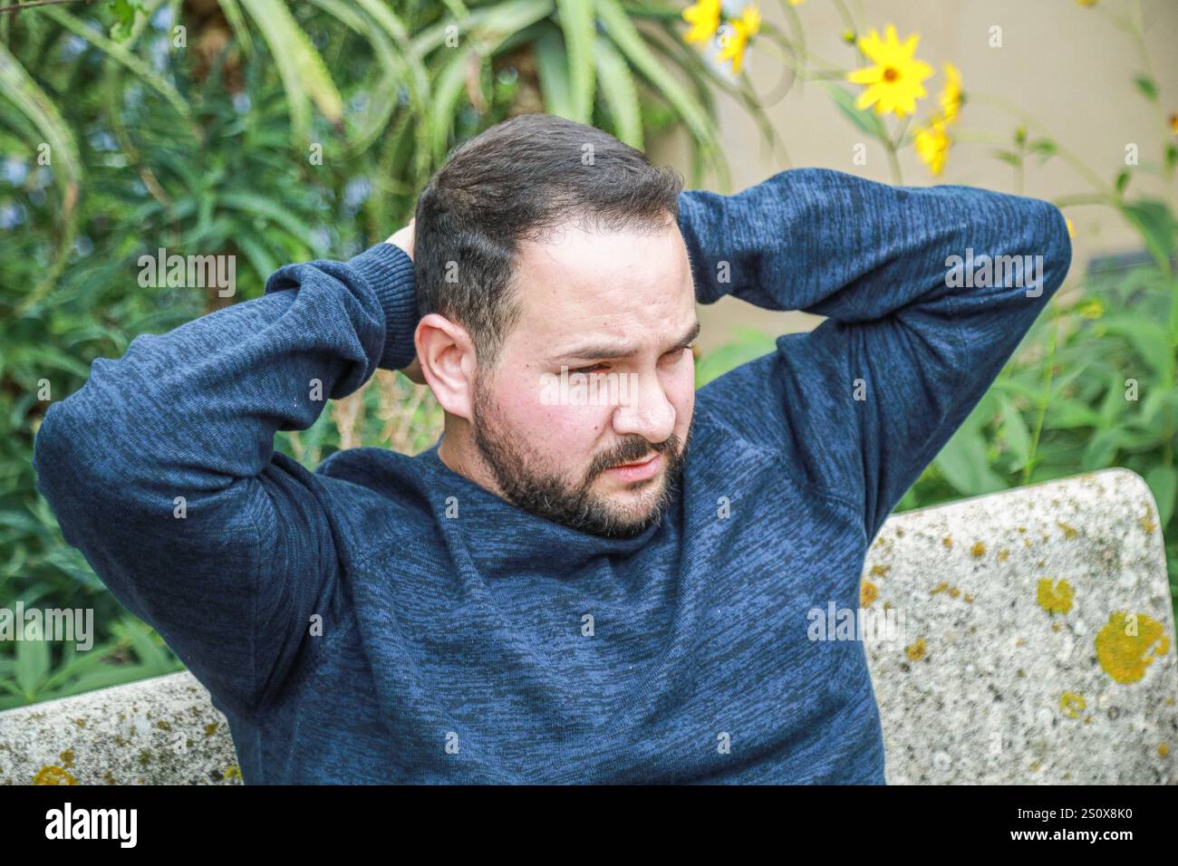 Tired Man On The Bench Relaxing Stock Photo - Alamy