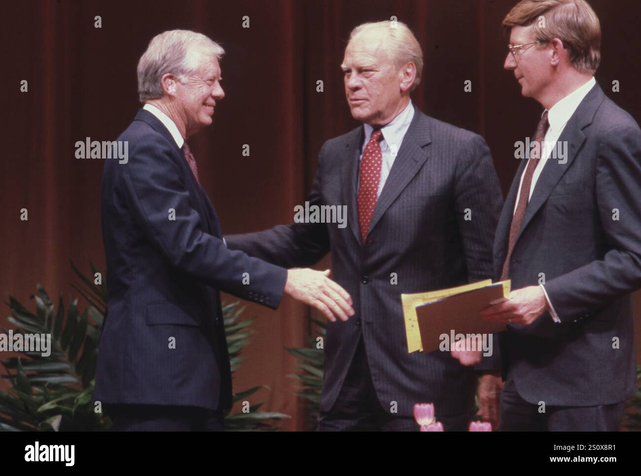 Former U.S. President JIMMY CARTER, l, greets former President GERALD ...
